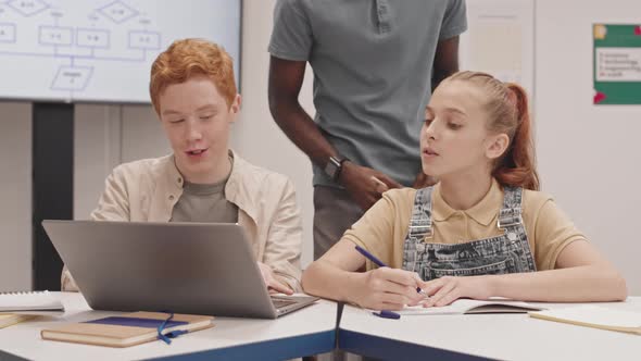Teacher Watching Students at Lesson, Stock Footage | VideoHive