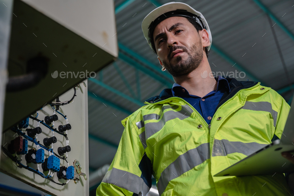 technician inspection engineer working to maintenance a construction ...