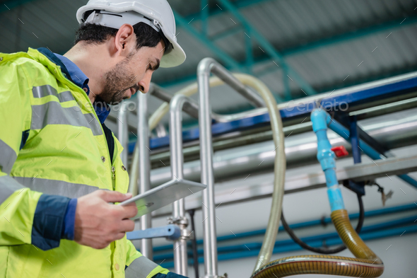 technician inspection engineer working to maintenance a construction ...