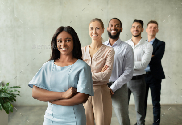 Business Team. Black Female Boss Posing With Her Employees In Office ...