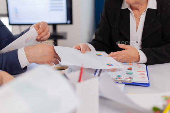 Close up view desk full of papers stats shown on charts Stock Photo by ...