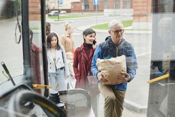 People Entering Bus Stock Photo by seventyfourimages | PhotoDune