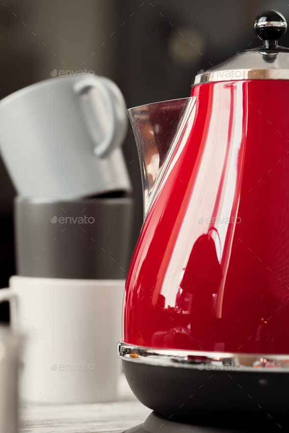 Vintage style red electrical teapot in kitchen interior Stock Photo by ...