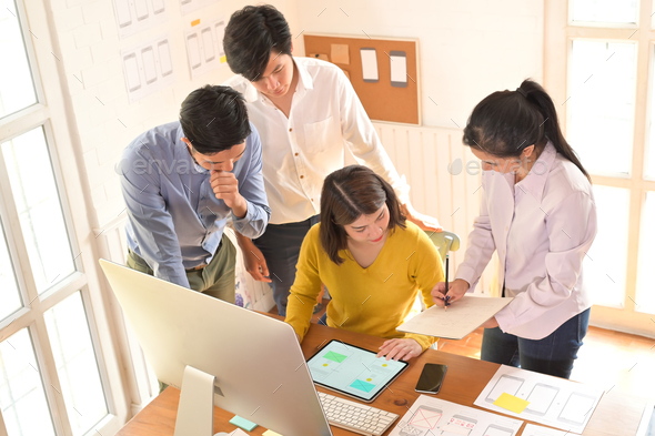 UX UI concept, Development software Team working with UX UI project in ...