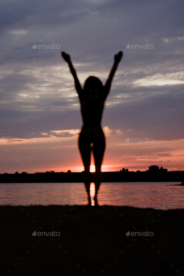 Silhouette of woman posing at sunset Stock Photo by XavierPardina ...