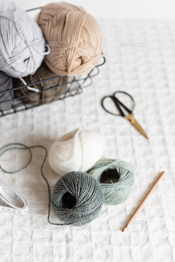 Craft hobby background with yarn in natural colors. Recomforting ...