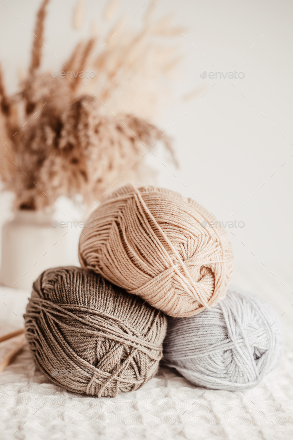 Craft hobby background with yarn in natural colors. Recomforting ...