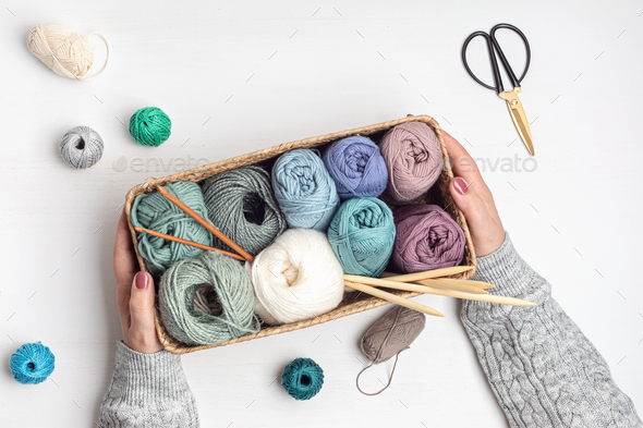 Craft hobby background with yarn in natural colors. Recomforting ...