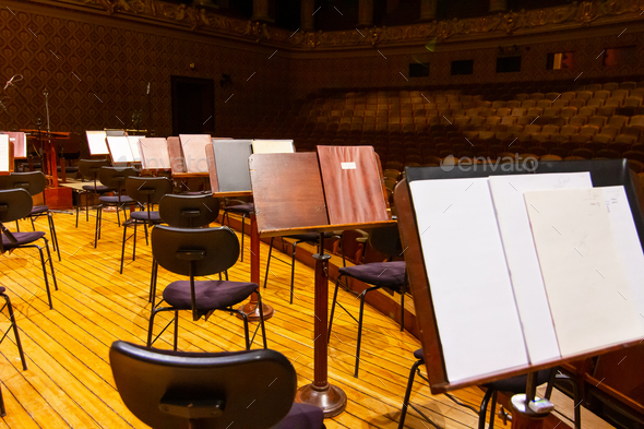 Music books and sheets with musical notation on the stands ready to the ...