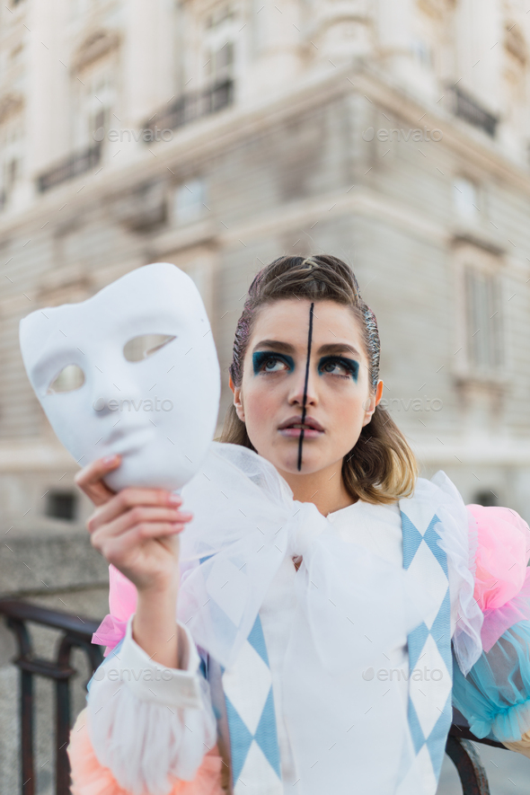 Street performer with white mask Stock Photo by ADDICTIVE_STOCK | PhotoDune