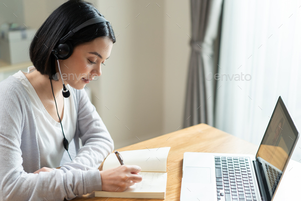 Homeschool Caucasian cute young girl student learning virtual internet ...
