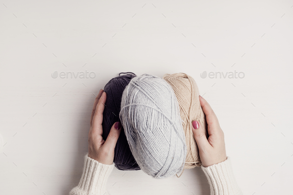 Craft hobby background with yarn in natural colors. Recomforting ...