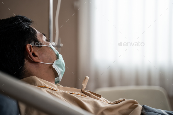 Sickness Asian senior man have a recovery rest on bed after covid cure ...