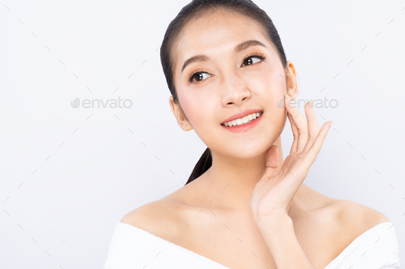 Beautiful Young Asian woman with clean fresh white skin touching her ...