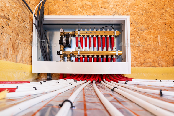 Distributor of Central underfloor heating system Stock Photo by ...