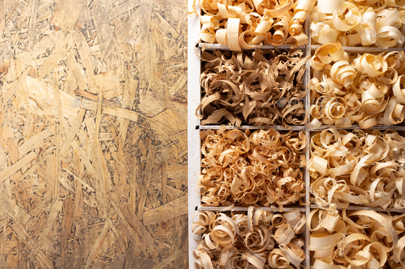Wood shavings in box on table background. Wooden shaving at old plank ...