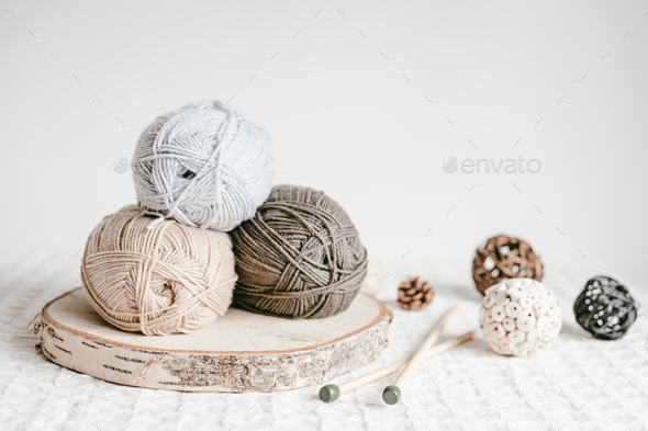 Craft hobby background with yarn in natural colors. Recomforting ...
