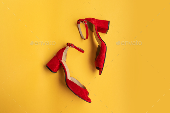 Trend beautiful bright red shoes on a thick colored background. Top ...