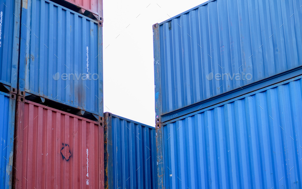 The layer of cargo container in shipping area with day light. Stock ...