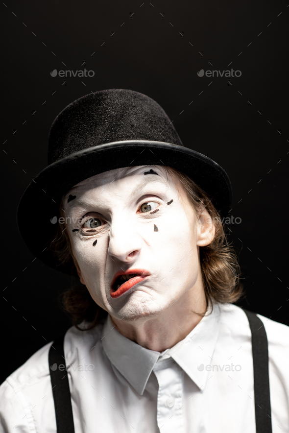 Pantomime on the black background Stock Photo by RossHelen | PhotoDune