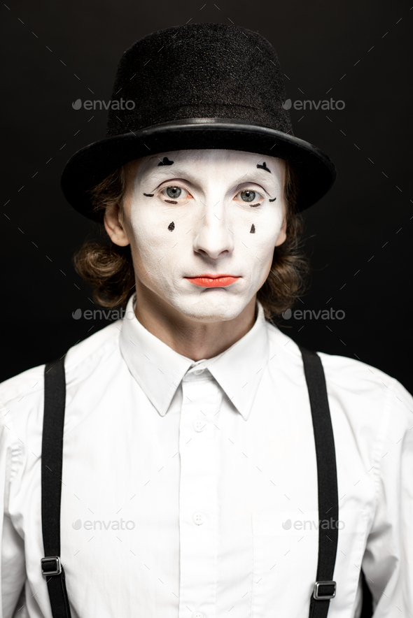 Pantomime on the black background Stock Photo by RossHelen | PhotoDune