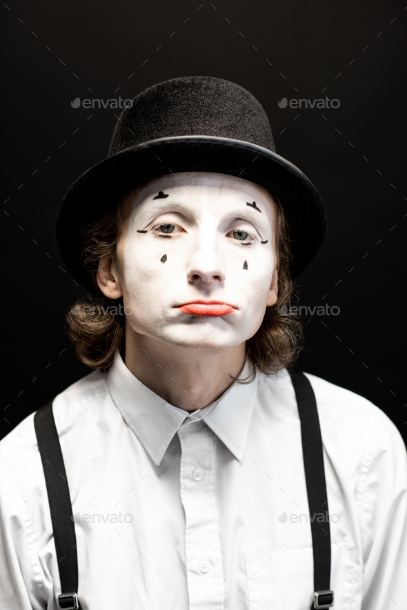 Pantomime on the black background Stock Photo by RossHelen | PhotoDune