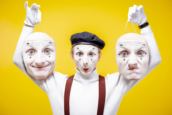 Pantomime with different facial masks Stock Photo by RossHelen | PhotoDune