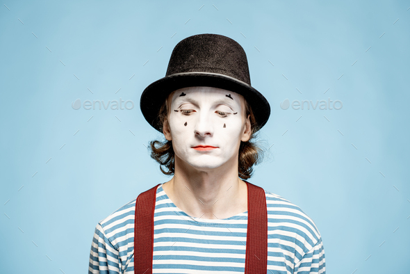 Pantomime on the blue background Stock Photo by RossHelen | PhotoDune