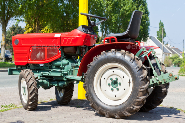 New Red Tractor Stock Photo by nzooo | PhotoDune