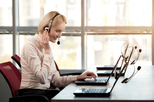 Side view woman wearing headset. Stock Photo by stockfilmstudio | PhotoDune