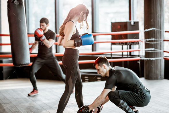 People training to box at the gym Stock Photo by RossHelen | PhotoDune