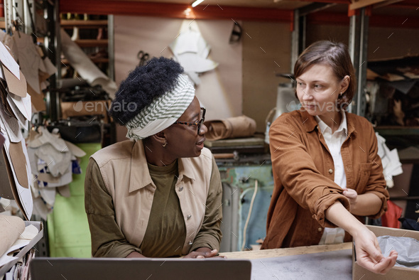 People working in the workshop Stock Photo by AnnaStills | PhotoDune