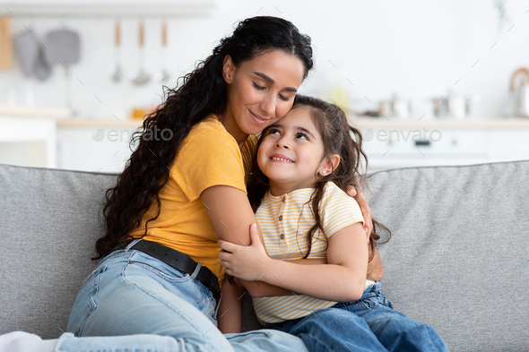 Mother's Love. Portrait Of Tender Young Arab Woman Hugging Her Little Daughter Stock Photo by ...