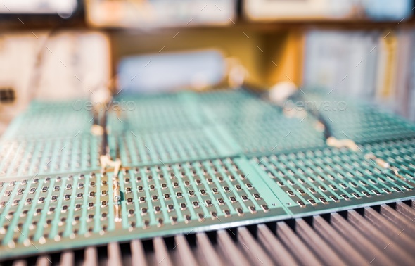 Close-up side view of a panel of SMD resistors Stock Photo by YouraPechkin