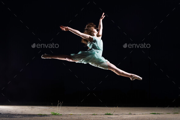 Ballet dancer leaping mid air Stock Photo by nualaimages | PhotoDune