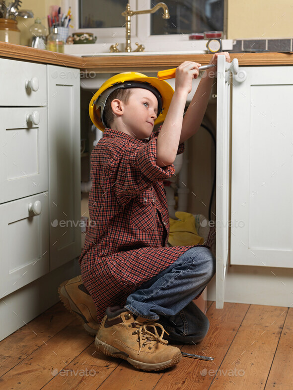 Boy dressed as repair man Stock Photo by nualaimages | PhotoDune
