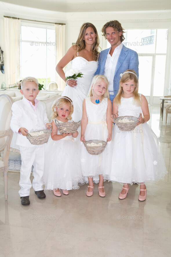 bride and groom with wedding children Stock Photo by ImageSourceCur