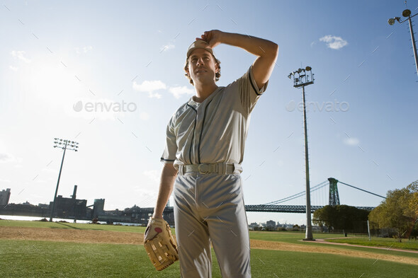 Baseball pitcher looking Stock Photo by ImageSourceCur | PhotoDune
