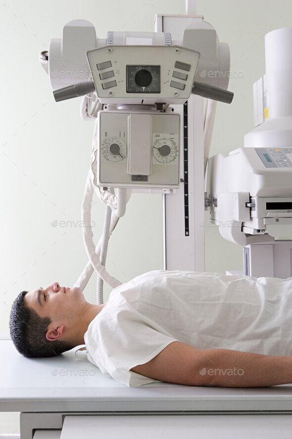 Patient and x-ray machine Stock Photo by ImageSourceCur | PhotoDune