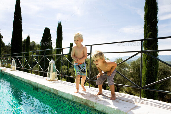 2 boys at pool Stock Photo by imagesourcecurated | PhotoDune
