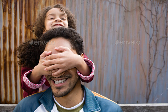 Daughter covering fathers eyes Stock Photo by imagesourcecurated ...