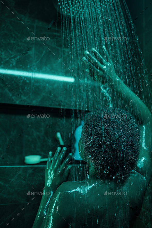 Woman washing herself in the shower Stock Photo by AnnaStills | PhotoDune