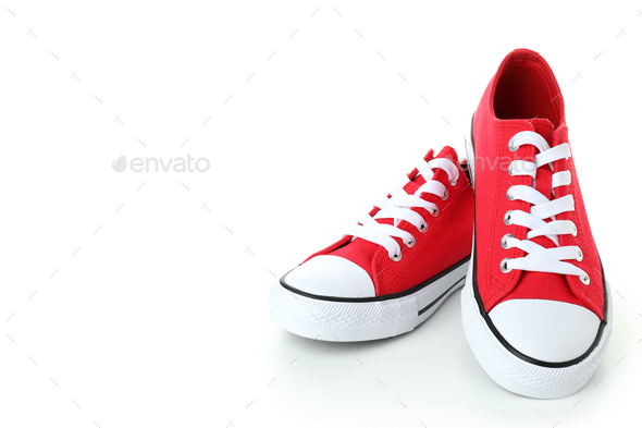 Pair of red sneakers isolated on white background Stock Photo by ...
