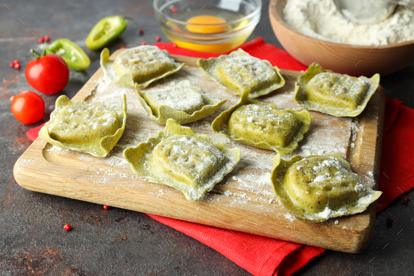 Concept of cooking ravioli on dark background Stock Photo by AtlasComposer