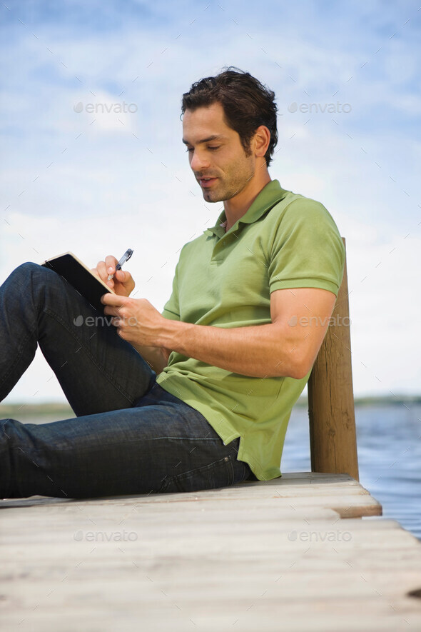 Man writing a letter Stock Photo by Image-Source | PhotoDune