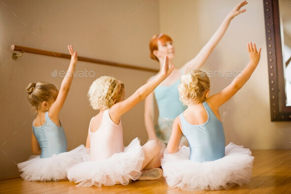 Girls posing in ballet class Stock Photo by Image-Source | PhotoDune