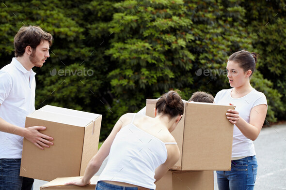 People stacking cardboard boxes Stock Photo by Image-Source | PhotoDune
