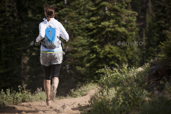 Runner on Bloods Lake trail near Guardsman Pass, Wasatch Mountains ...