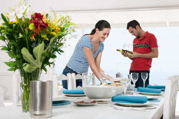 Preparing a table for a meal Stock Photo by Image-Source | PhotoDune