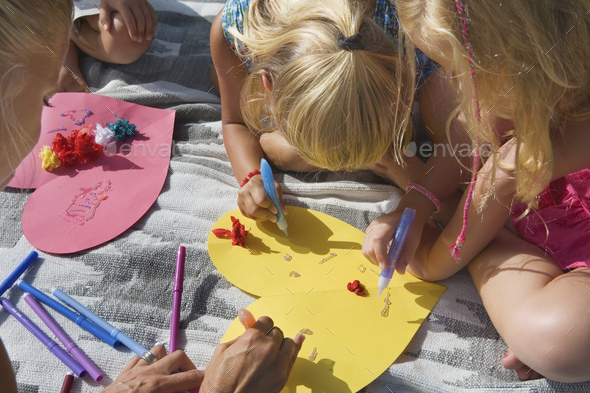 Teacher teaching students arts & crafts Stock Photo by Image-Source